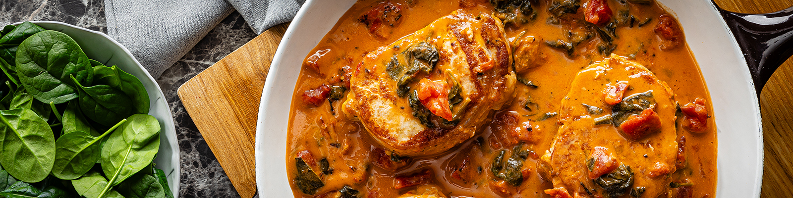 Creamy Tuscan Pork Chops Recipe | {{SiteName}} - The Fresh Grocer