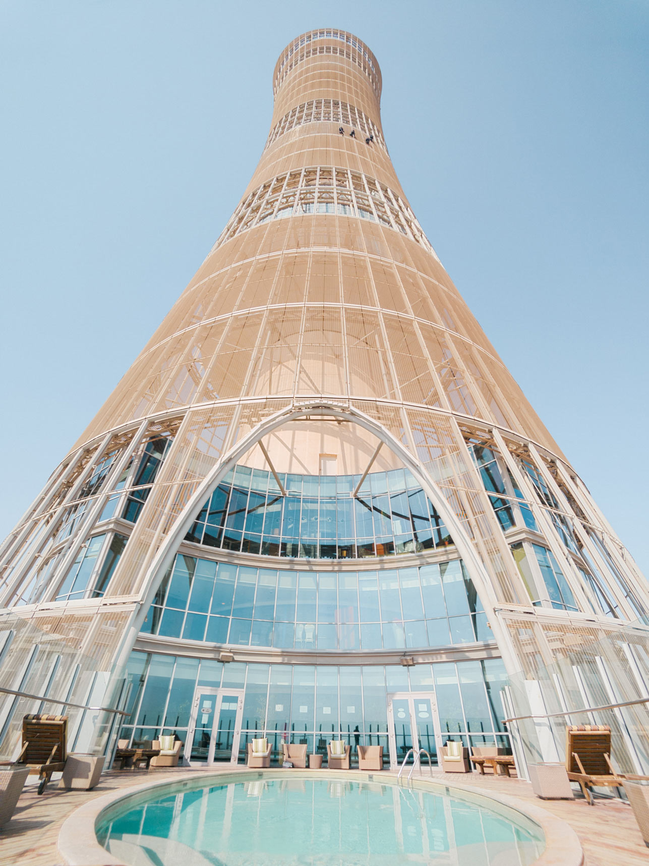 The Torch Hotel Building & Pool | Explorest