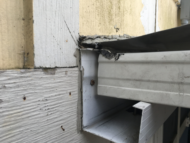 Deficiency:Existing repair failing due to age or improper repair.