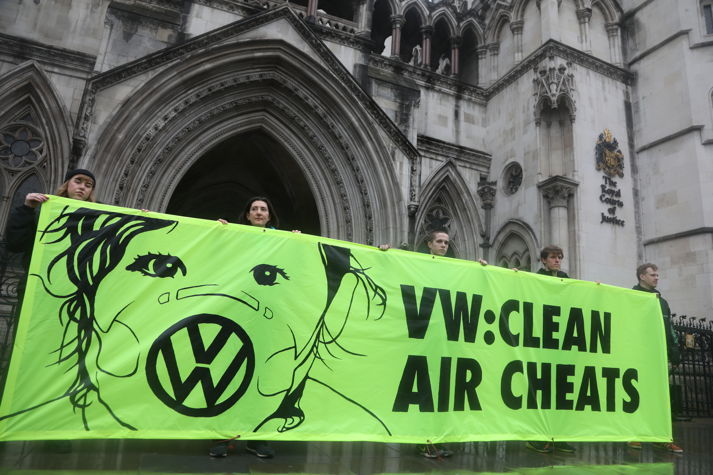 Protesters call for justice as VW in court over Dieselgate lawsuit ...