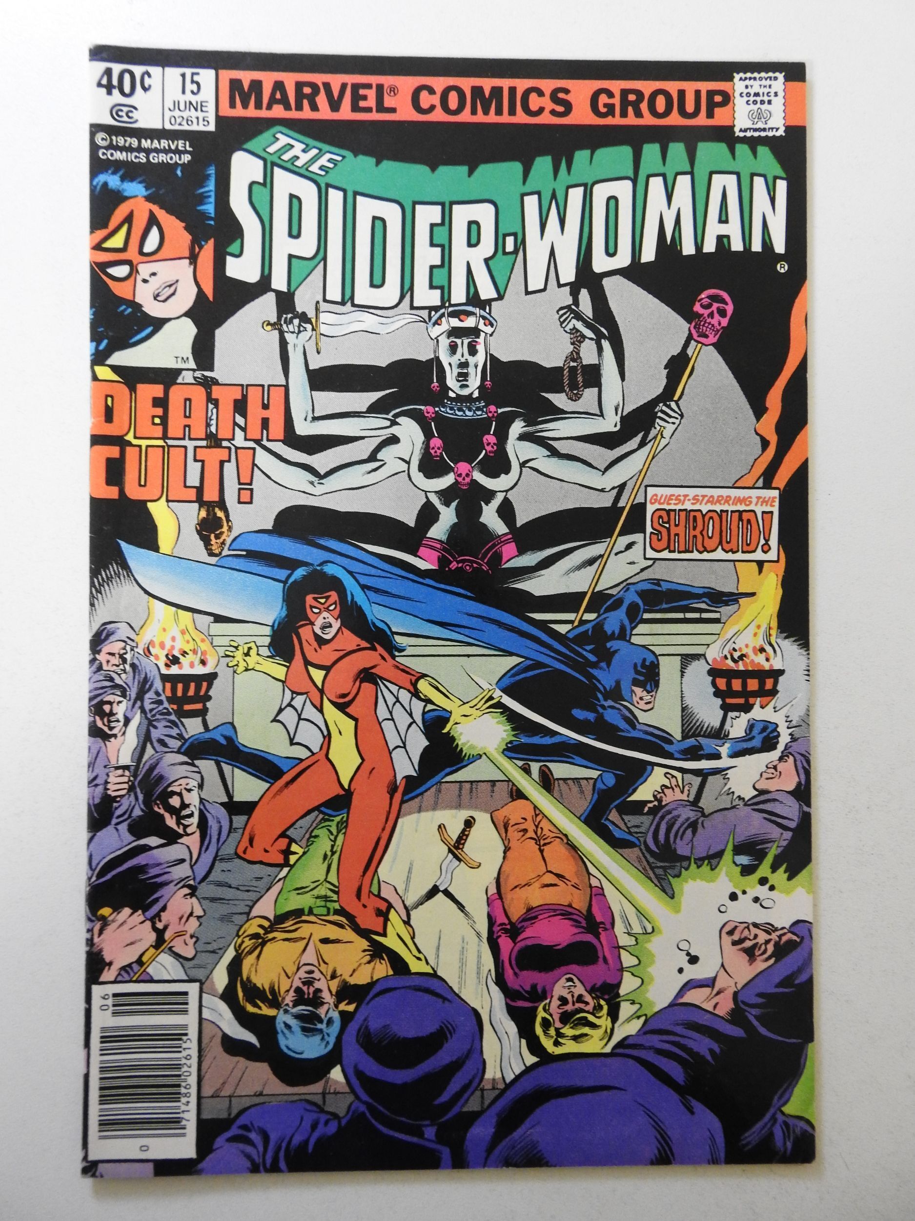 Spider-Woman #15 (1979) VG+ Condition centerfold detached bottom staple ...