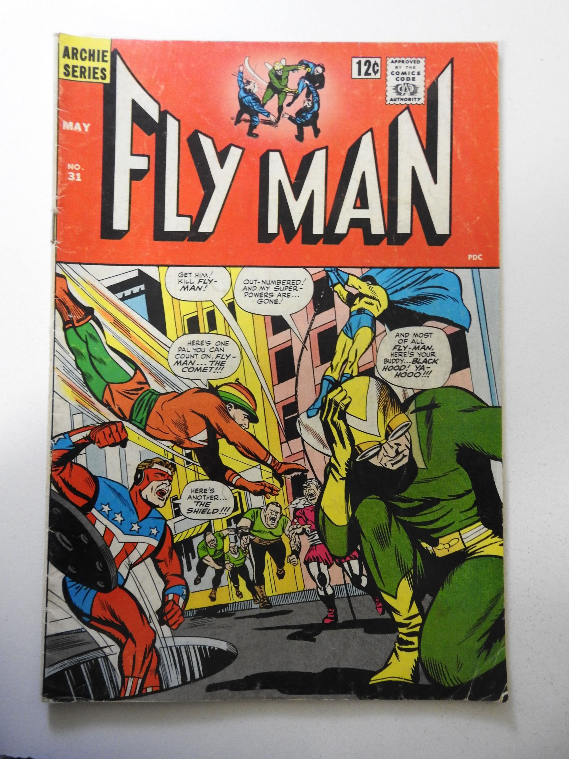 Fly Man #31 (1965) VG+ Condition- manufactured w/ 1 staple | Comic Books - Silver Age / HipComic