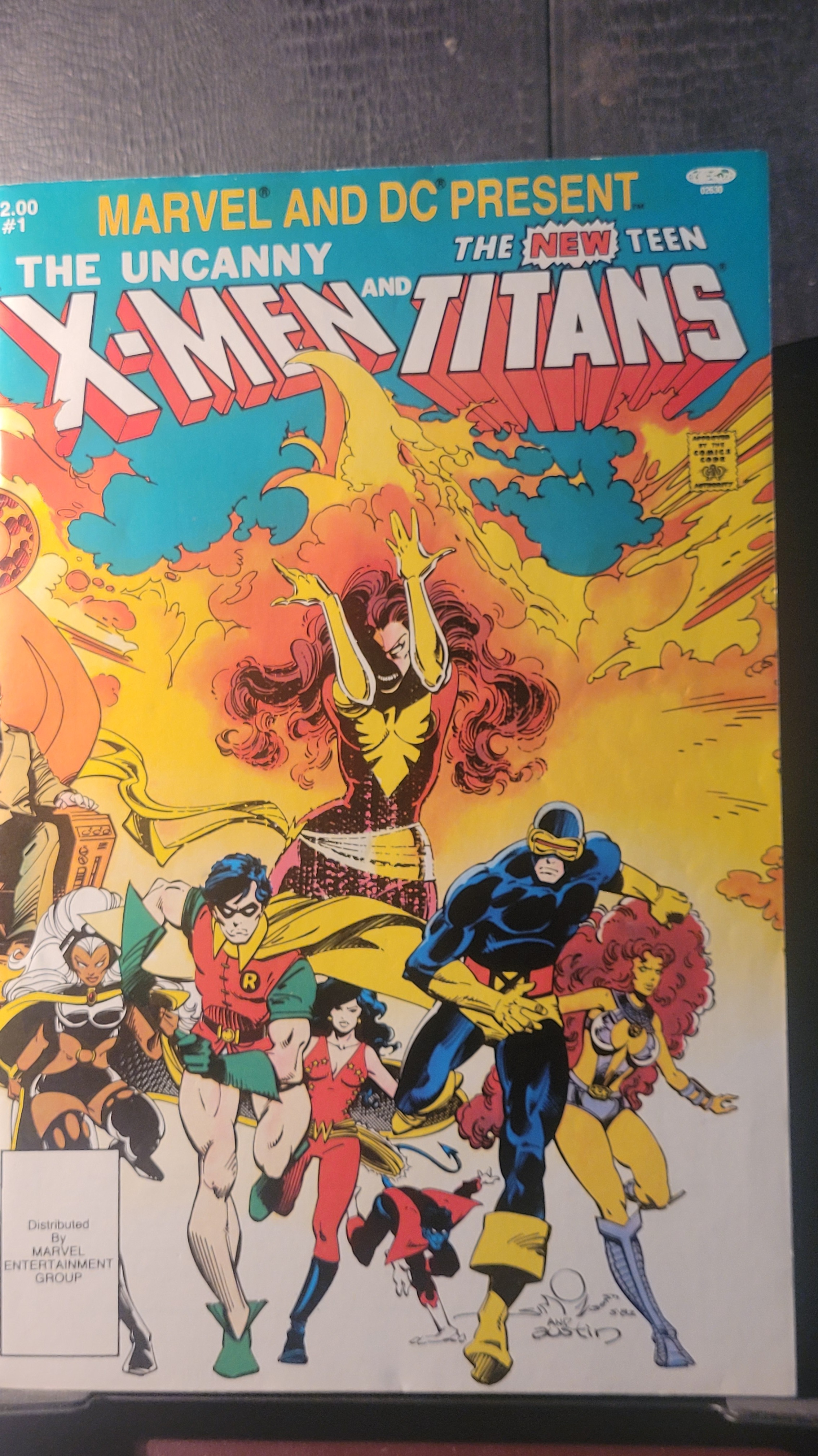 Marvel and DC Present featuring The Uncanny X-Men and The New Teen ...