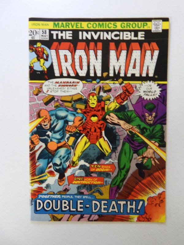 Iron Man #58 (1973) VG+ condition "top staple detached from cover ...