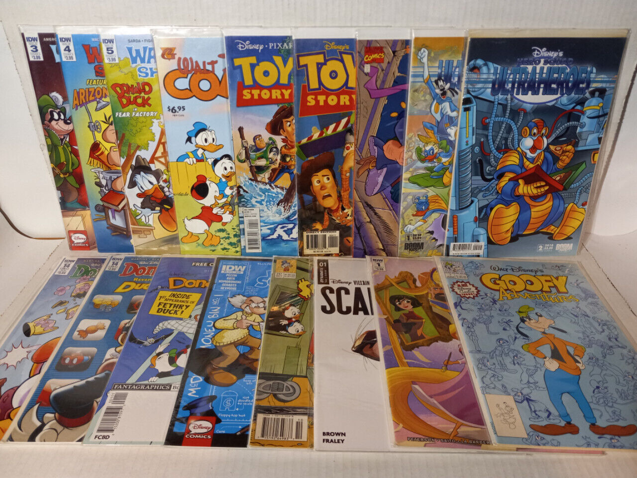 Disney: 17 Comics - Goofy, Scar, Ultraheroes, TOY Story, Tangled, Uncle ...