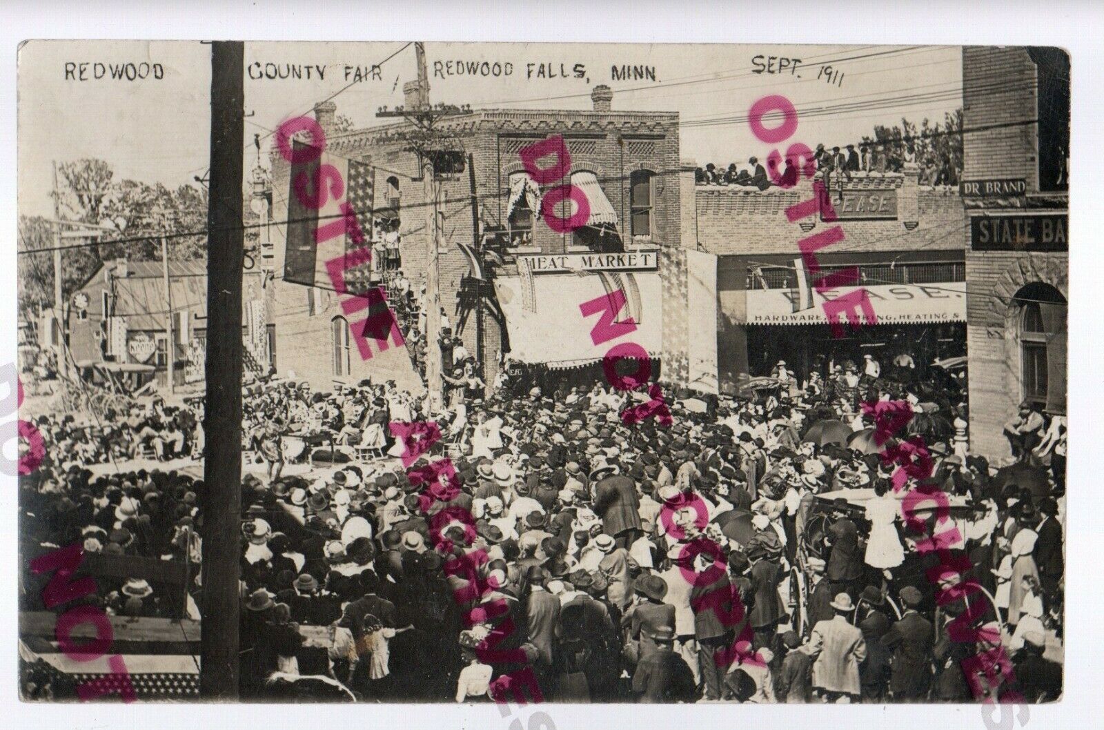 Redwood Falls MINNESOTA RPPC 1911 JUGGLER Main Street COUNTY FAIR Crowd ...