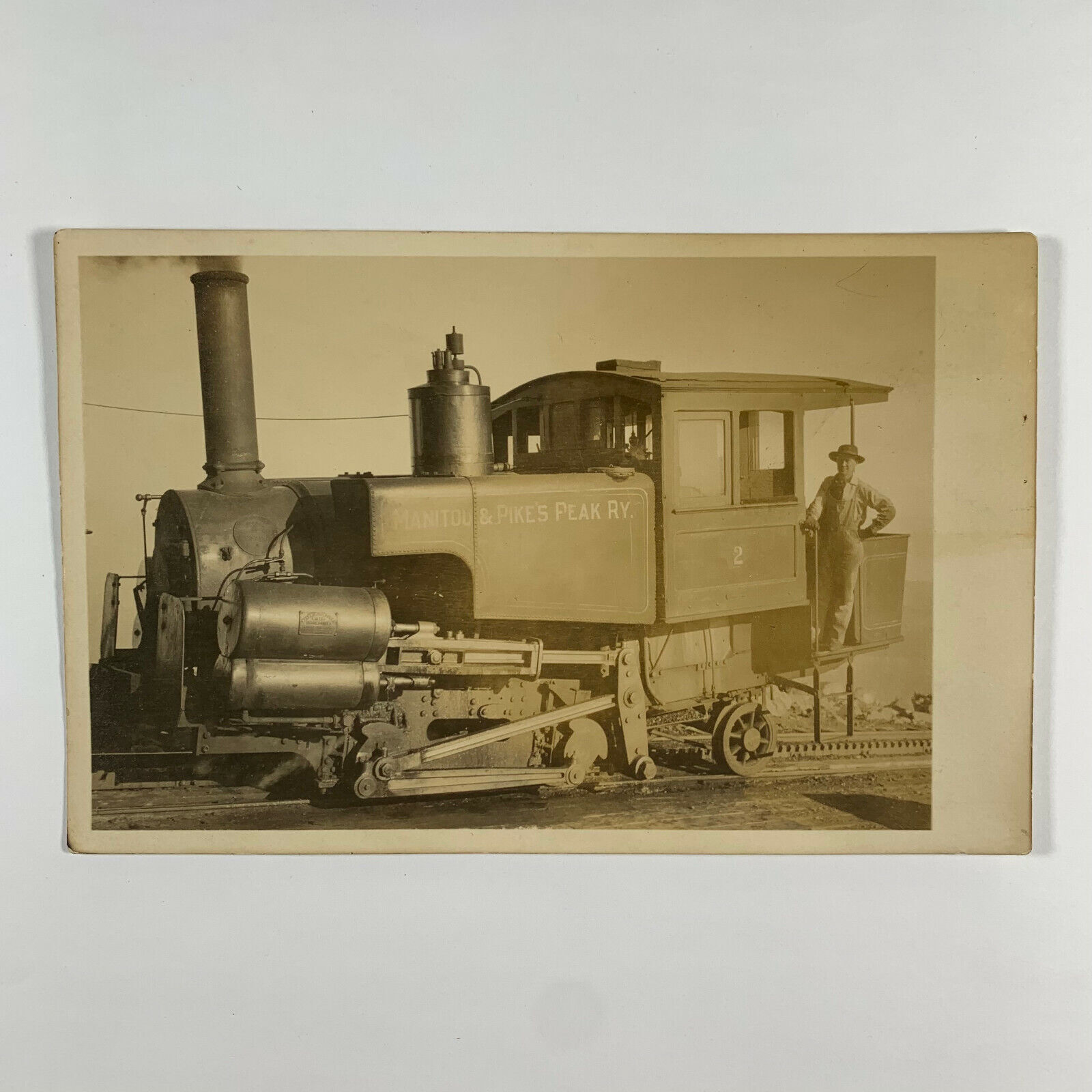 Postcard RPPC Colorado Pikes Peak CO Train Railroad Engineer CYKO 1920s ...