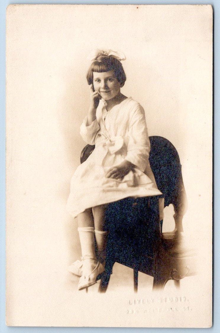 Rppc Girl Hair Bow*Embossed: Lively Studio*Posed on Chair*Noko Stamp ...