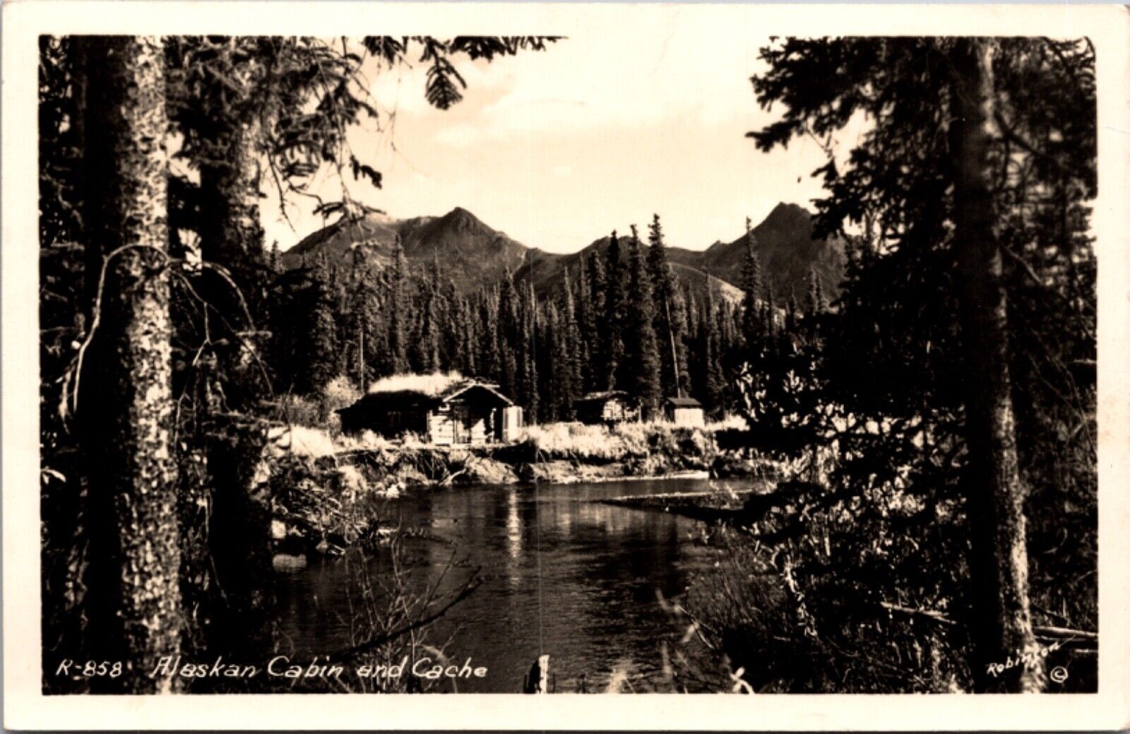 Real Photo Postcard Alaskan Cabin and Cache in Alaska | United States ...