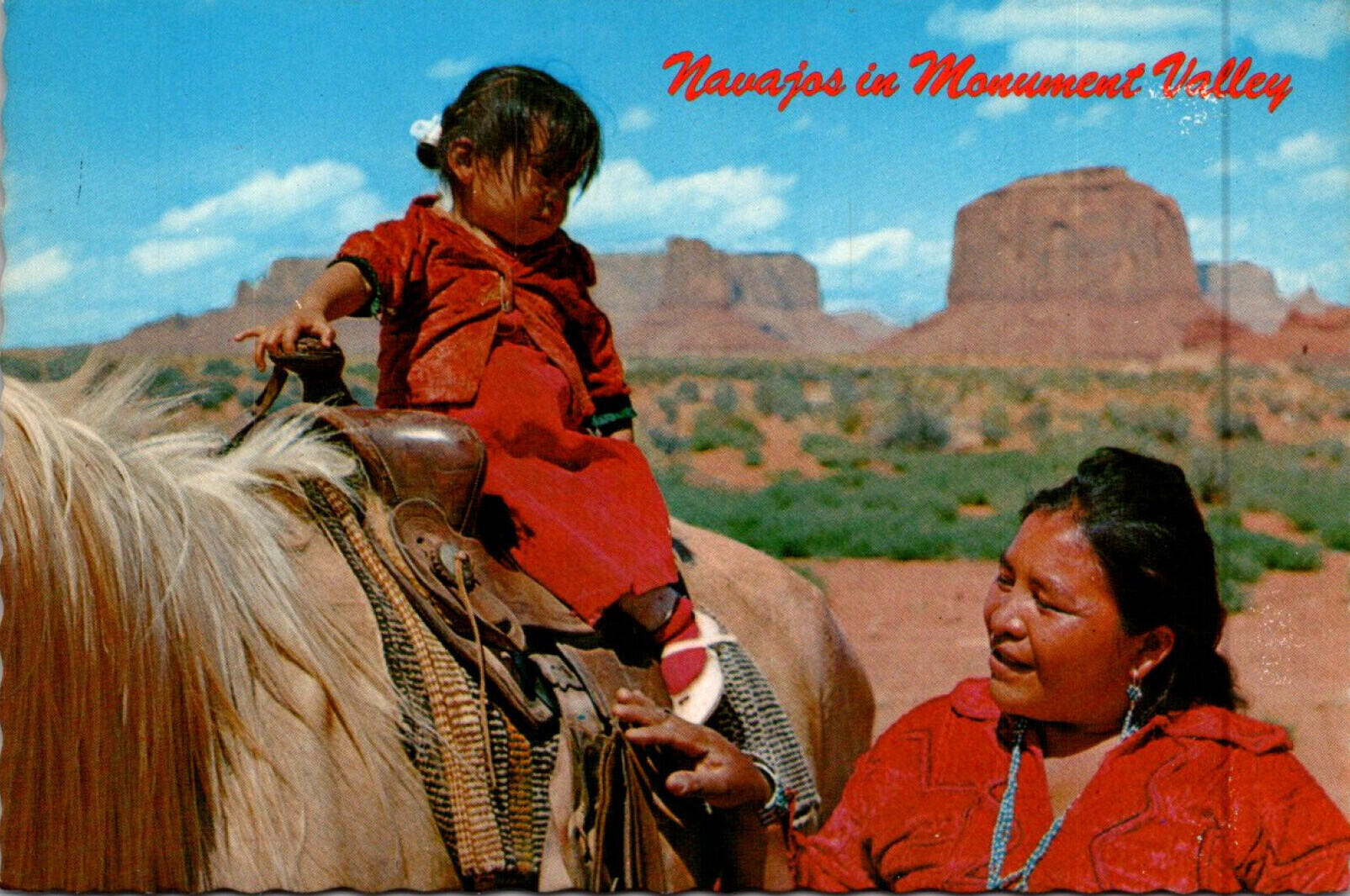 Navajo Indian Mother and Daughter On The Family Horse Monument Valley ...