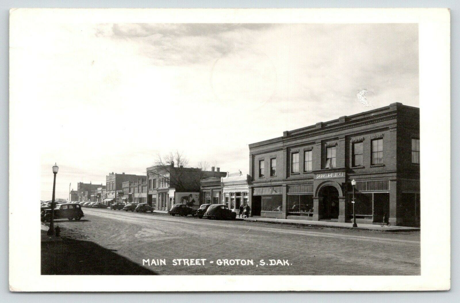Groton SD~Main St~Cassel Block~Fancy White Bldg~1940s Cars~Lamppost ...