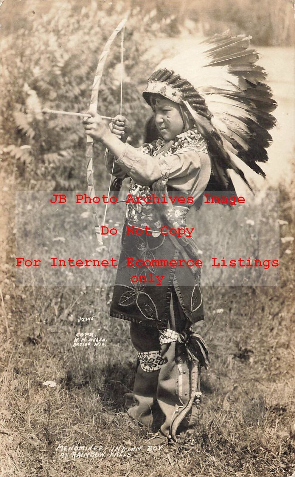 Native American Shooting Bow And Arrow