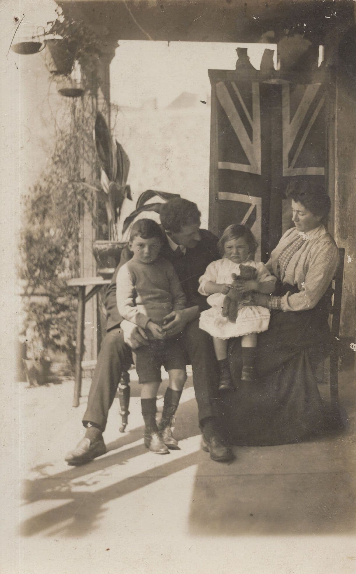 British Family in WW1 Giant Union Jack Flag Teddy Bear RPC Postcard ...