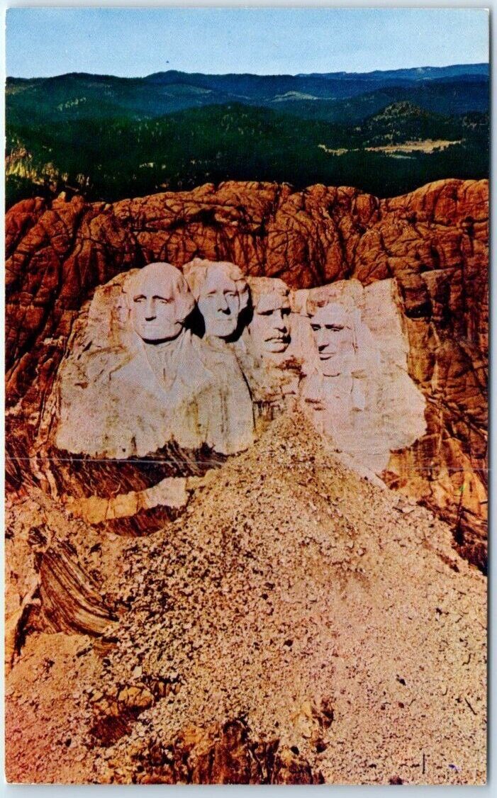 An aerial view of Mount Rushmore with the beautiful Black Hills - South ...