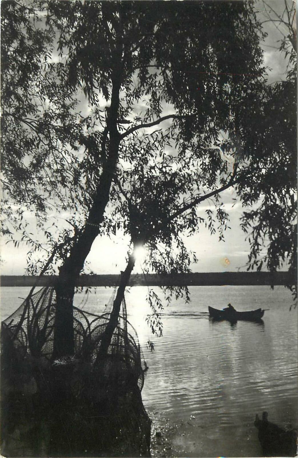 Romania Apus de soare in Delta Dunarii pescar barca Postcard | Europe ...