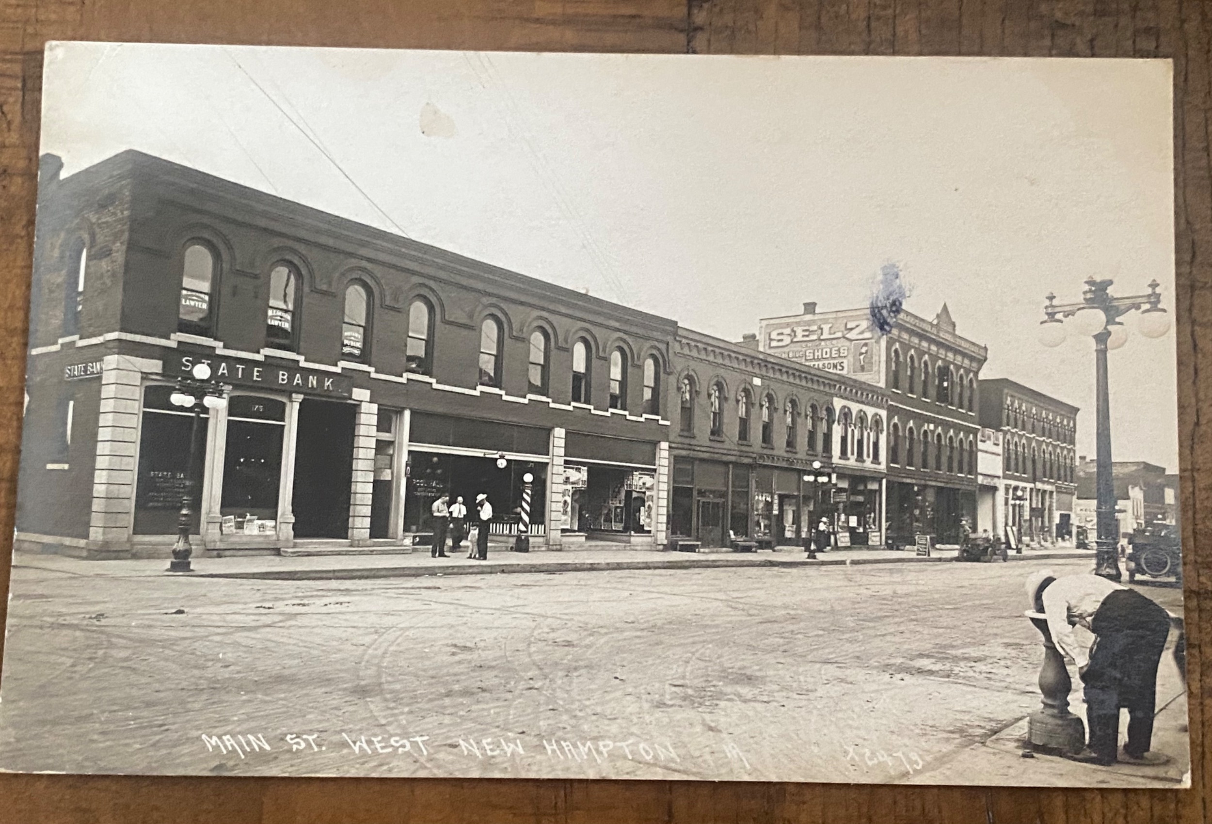 1916 RPPC New Hampton Iowa Main Street store signs | United States ...