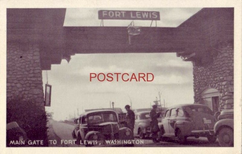 MAIN GATE TO FORT LEWIS, WASHINGTON soldiers inspect identification ...
