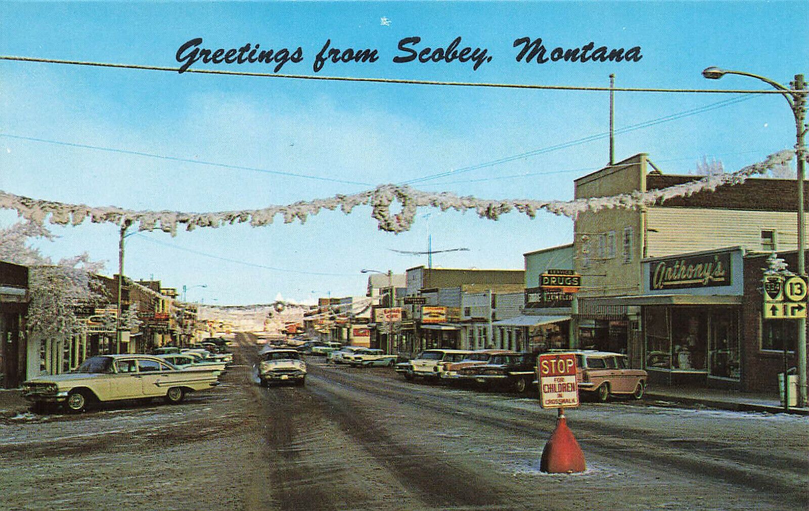 Scobey MT Busy Street View Storefronts Anthony's Old Cars Postcard ...