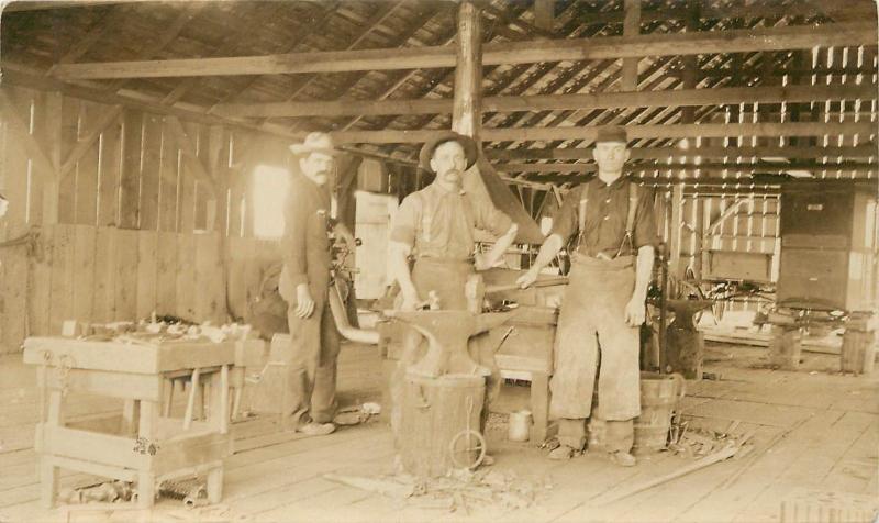 c1910 RPPC; Cloverdale OR Men in Blacksmith Shop Wheelwright Machines ...
