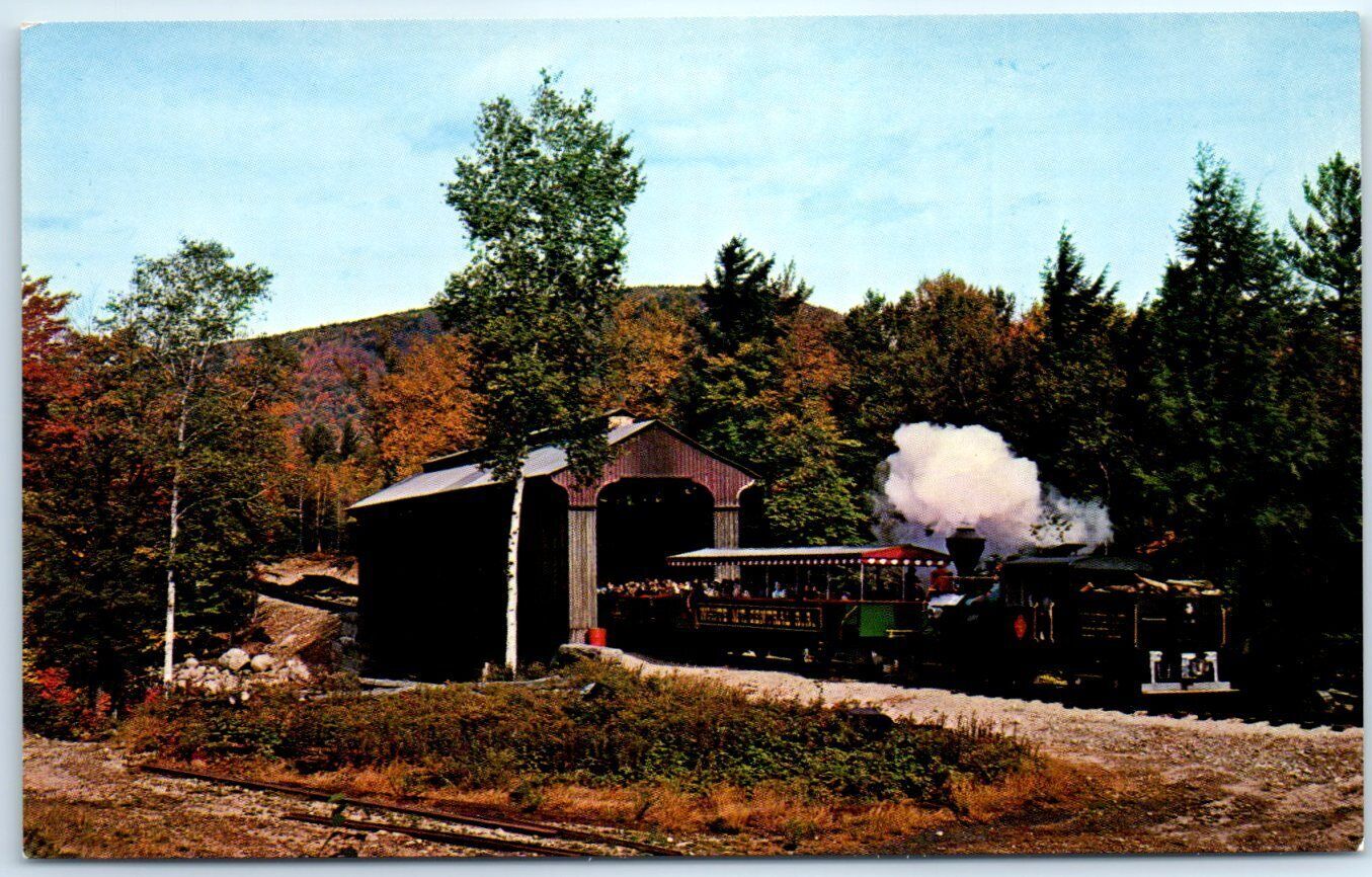 Passenger Train Entering Covered Railroad Bridge On White Mt. Central ...