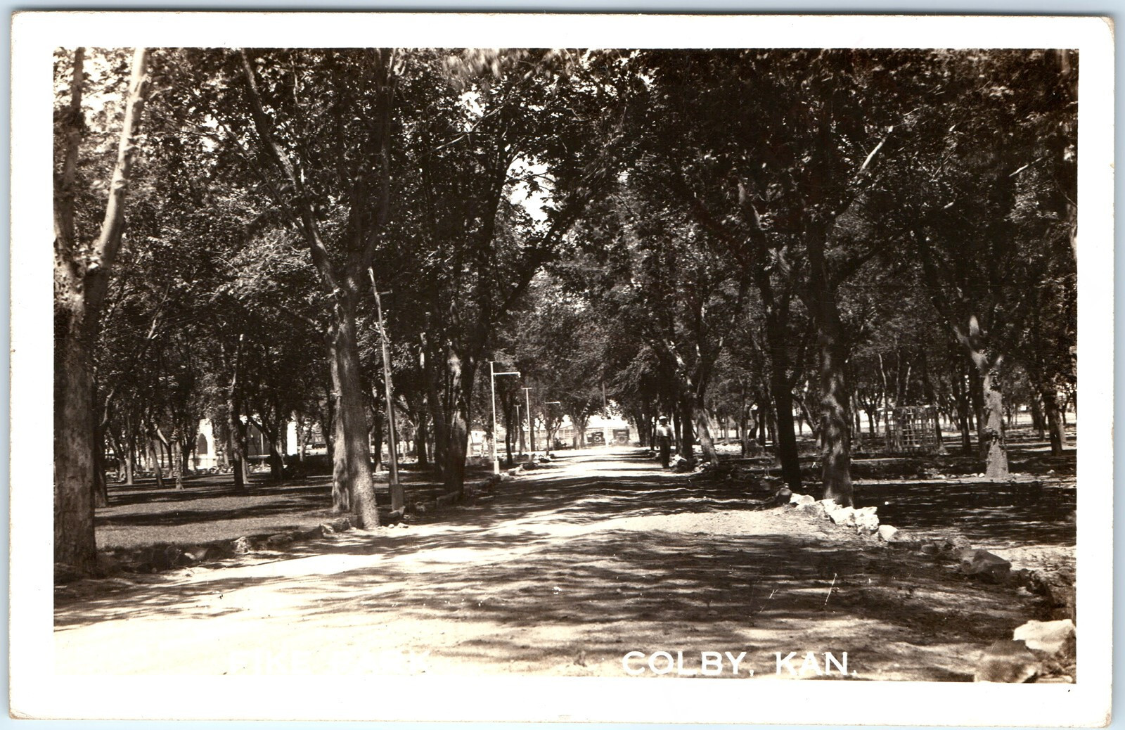 c1940s Colby, KS RPPC Fike Park Postcard Trucks Tree Path Shaded Road ...