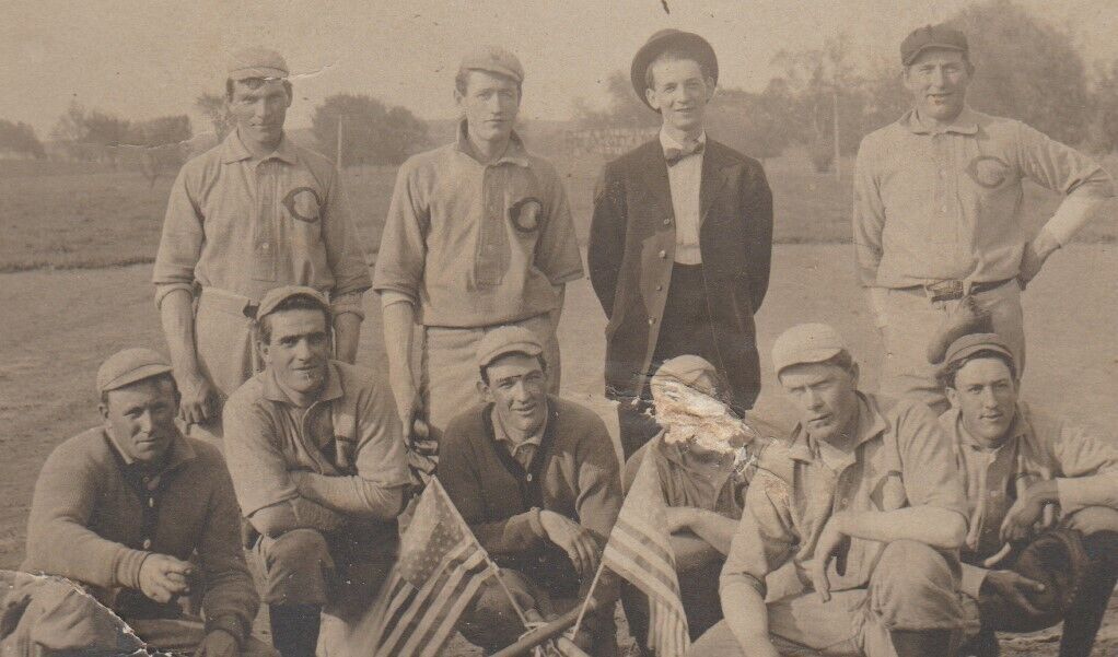 Cascade IOWA RPPC 1908 BASEBALL TEAM Club AMERICAN FLAG Bill Anderson ...