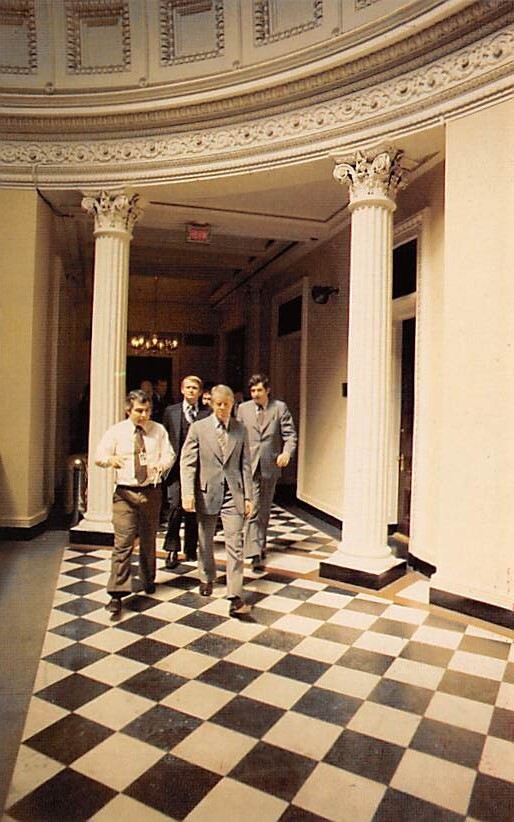 President Jimmy Carter, accompanied by aids President Jimmy Carter ...