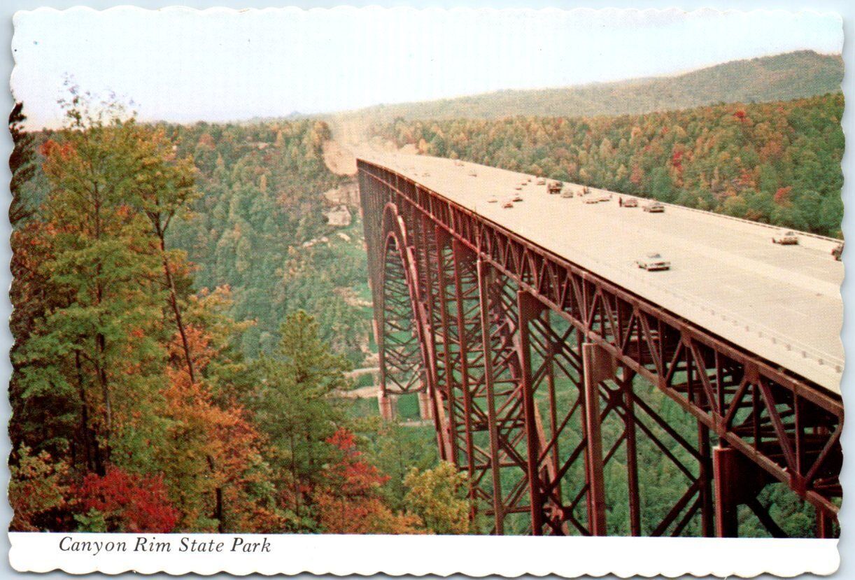 Side view of the New River Gorge Bridge, Canyon Rim State Park ...