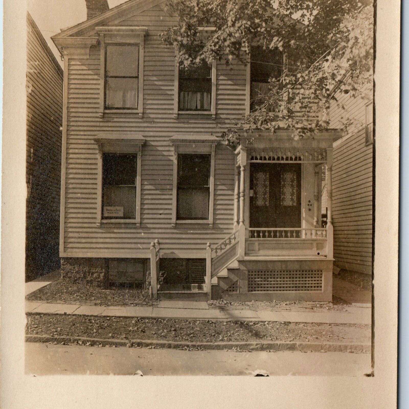 c1910s Row House RPPC Fancy Wood Trim Real Photo Dress Suit Making Sign ...