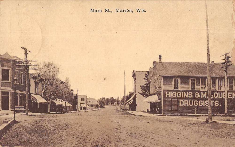 Marion Wisconsin Main Street Higgins and McQueen Druggists Postcard ...