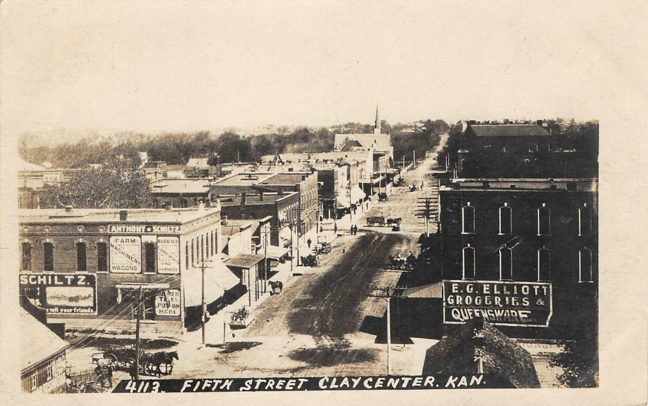 RPPC CLAY CENTER, KS 5th Street Scene EG Elliott Groceries Schlitz 1912 ...