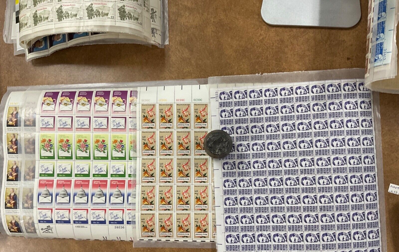 48 sheets most 20c-22c discount postage $435 about 3,100 stamps stuck ...