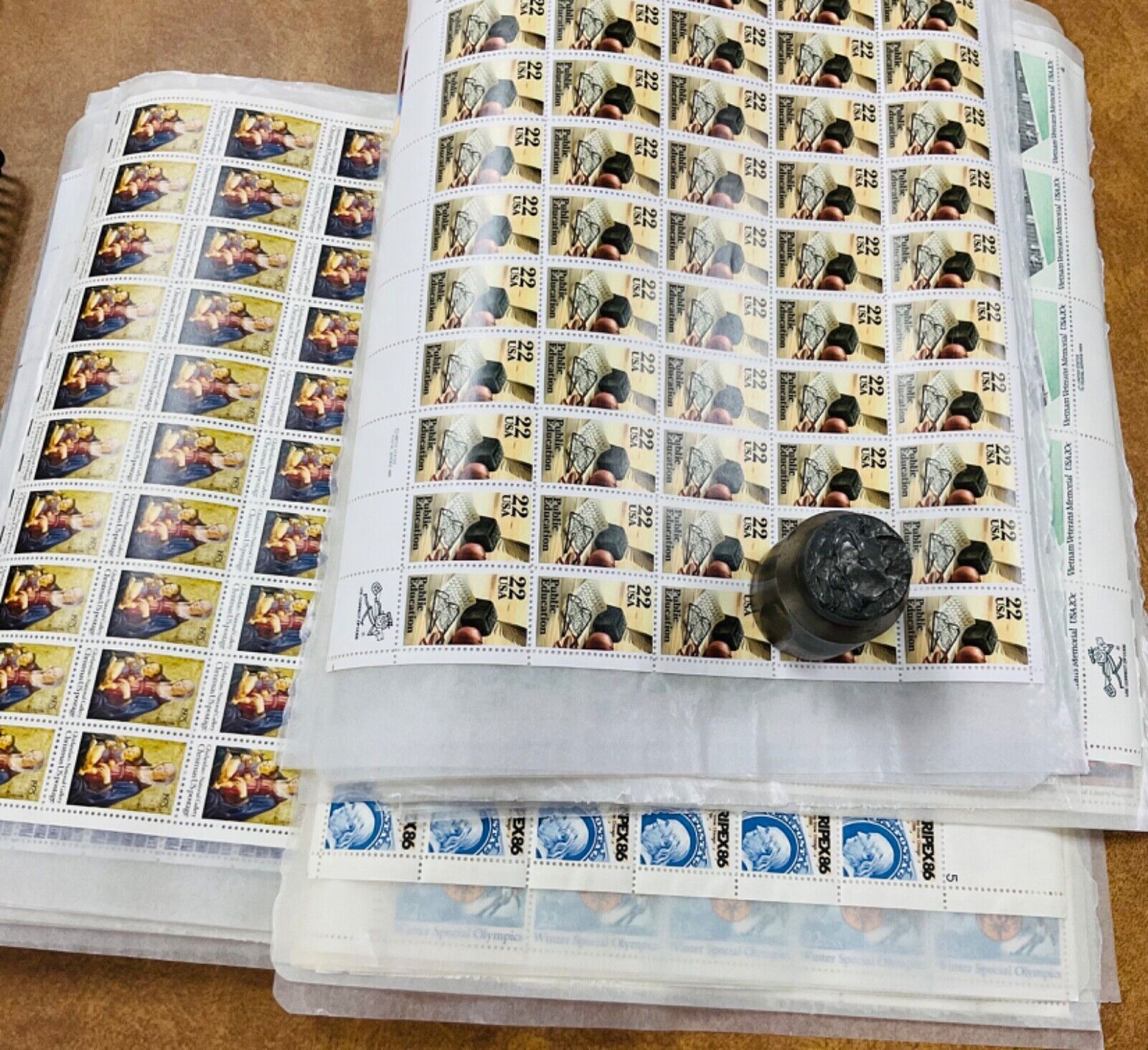 48 sheets most 20c-22c discount postage $435 about 3,100 stamps stuck ...
