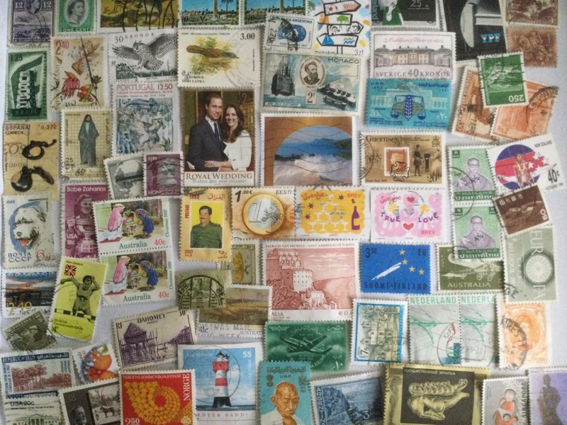 World kiloware - 60+ gms. (C) Includes a few GB commems. Off paper. 500 ...