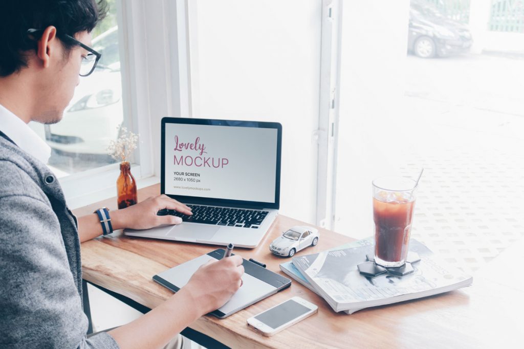 Macbook Mockup And A Hard Working Man - Lovely Mockups