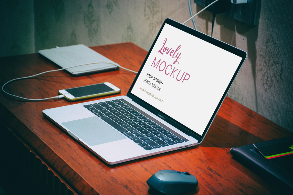 Macbook Pro Mockup On Red Table - Lovely Mockups