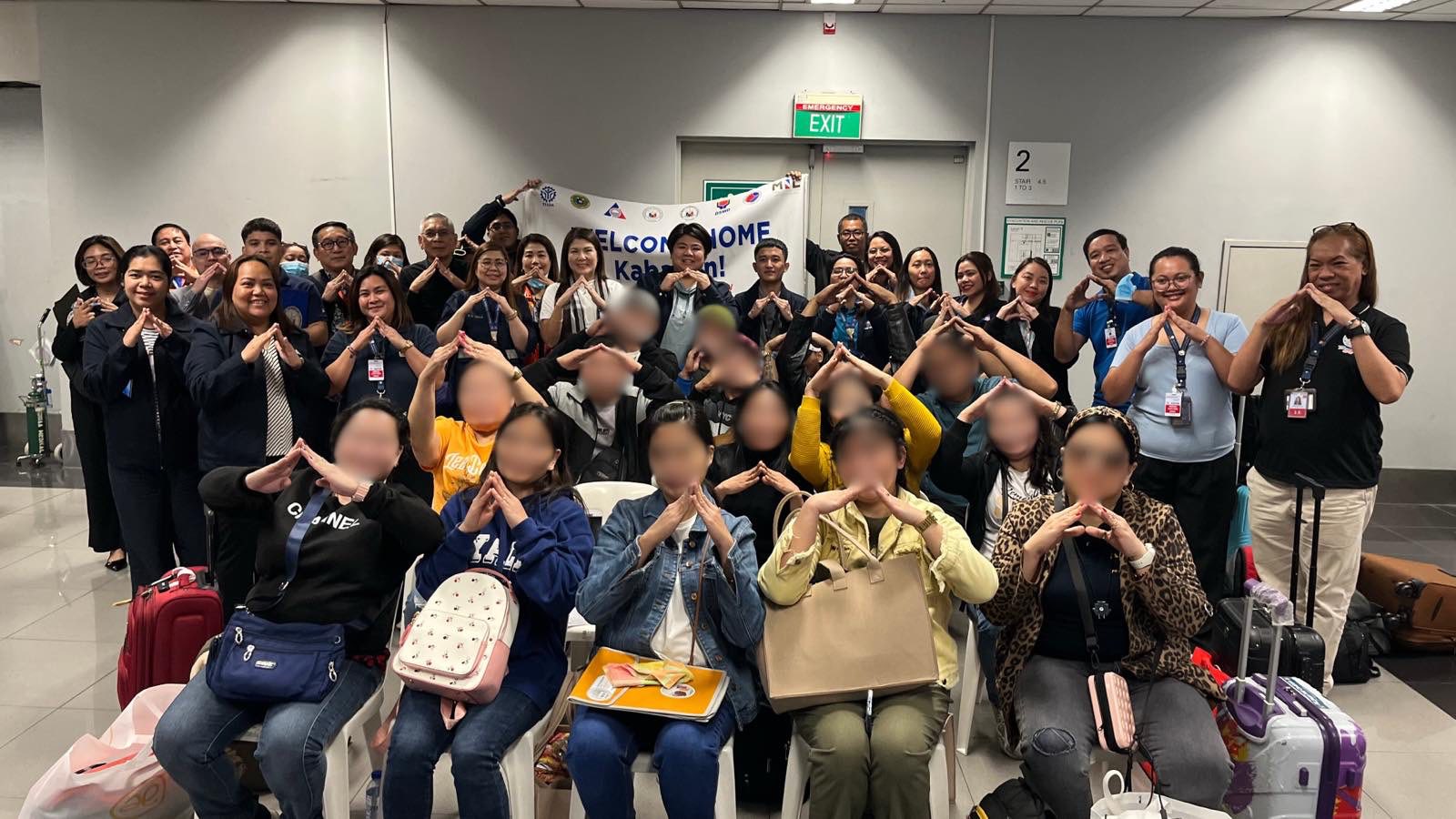 49 OFWs from KSA return home; receive whole-of-government support