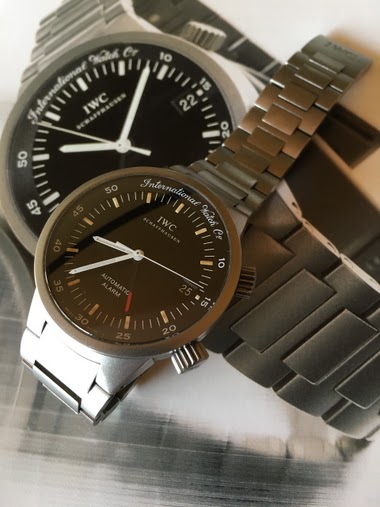 JLC - Two alarm watches with similar DNA...