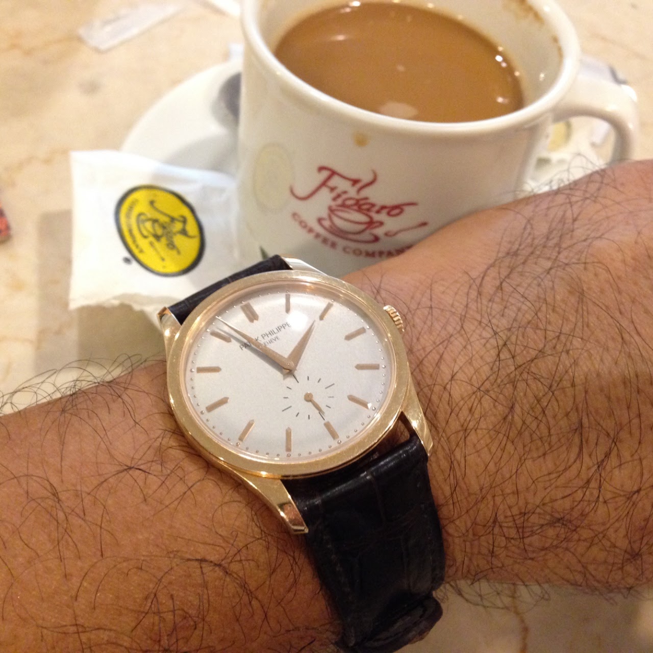 Patek Philippe - In a coffee shop , meeting a friend. Simple ...