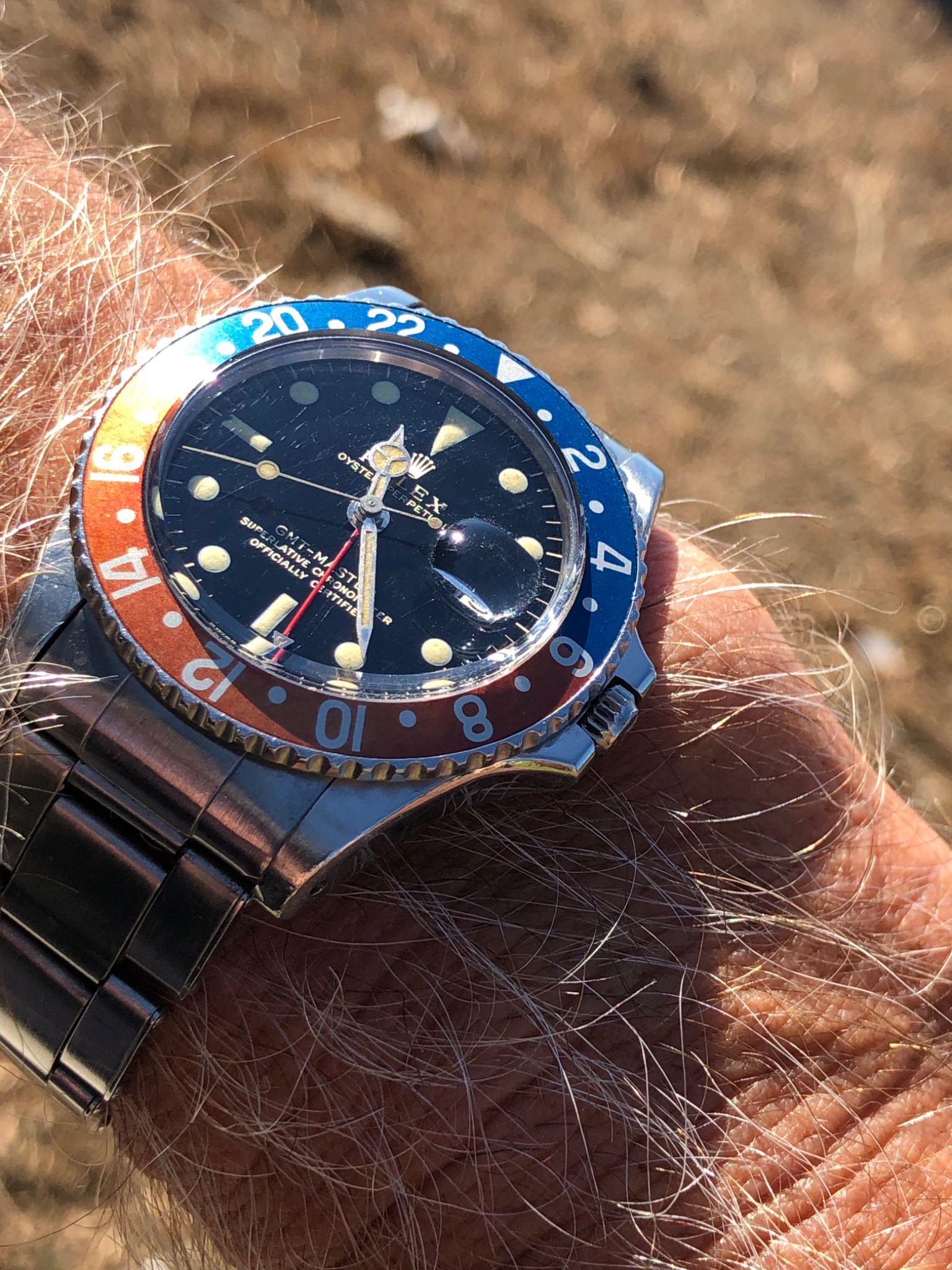 Rolex - Rolex 1675 gilt enjoying the sunshine with a Submariner.