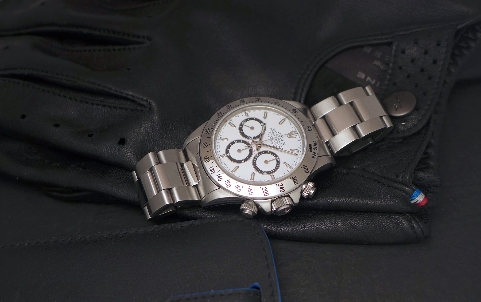 Rolex - Rolex Daytona 16520 on driving gloves.