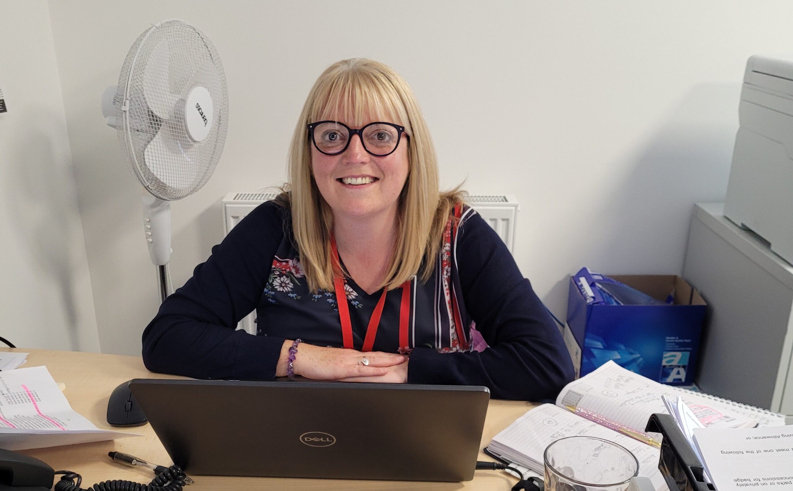 Charity worker professional problem solver for those with visual ...