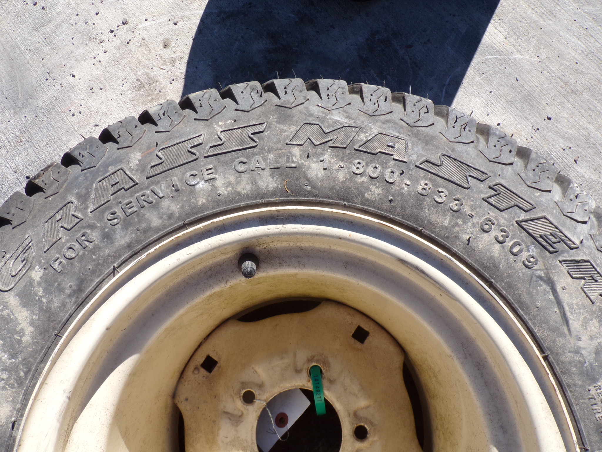 #8277 24x12-12 Grassmaster Turf Tire on Rim $95.00 - JM Equipment