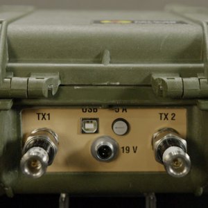 Portable, Dual-Band Transmitter simulates indoor CW coverage