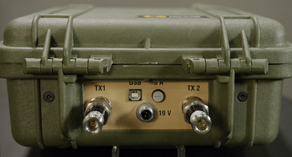 Portable, Dual-Band Transmitter simulates indoor CW coverage