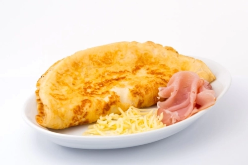 Houd u van bacon en kaas dan is deze eiwitrijke pannenkoek de juiste ...