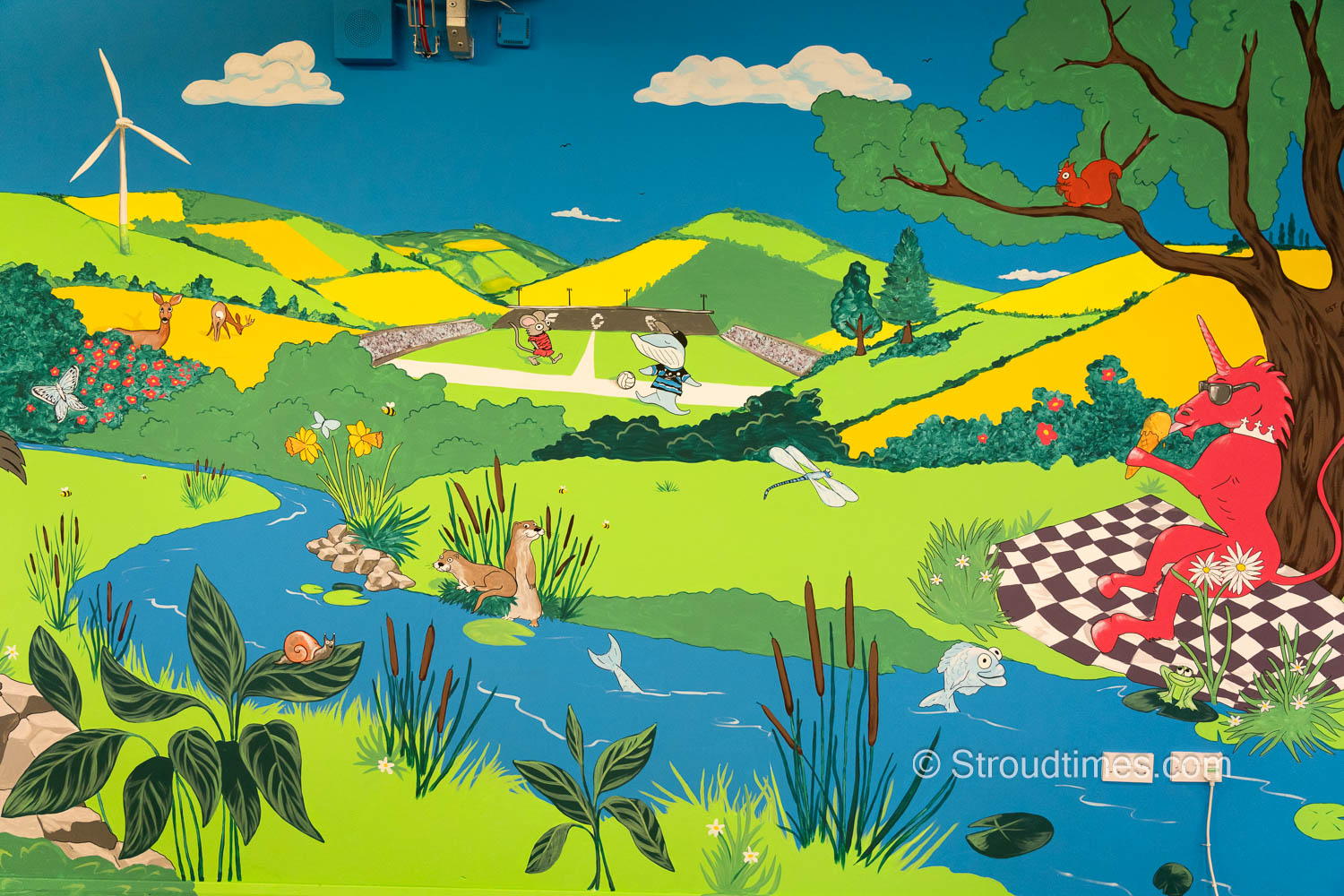 Back of the net! Kat completes mural ahead of new football season ...