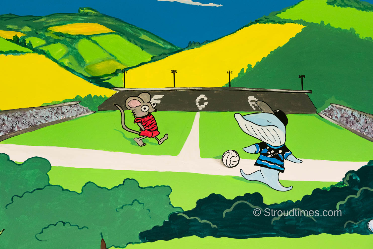 Back of the net! Kat completes mural ahead of new football season ...