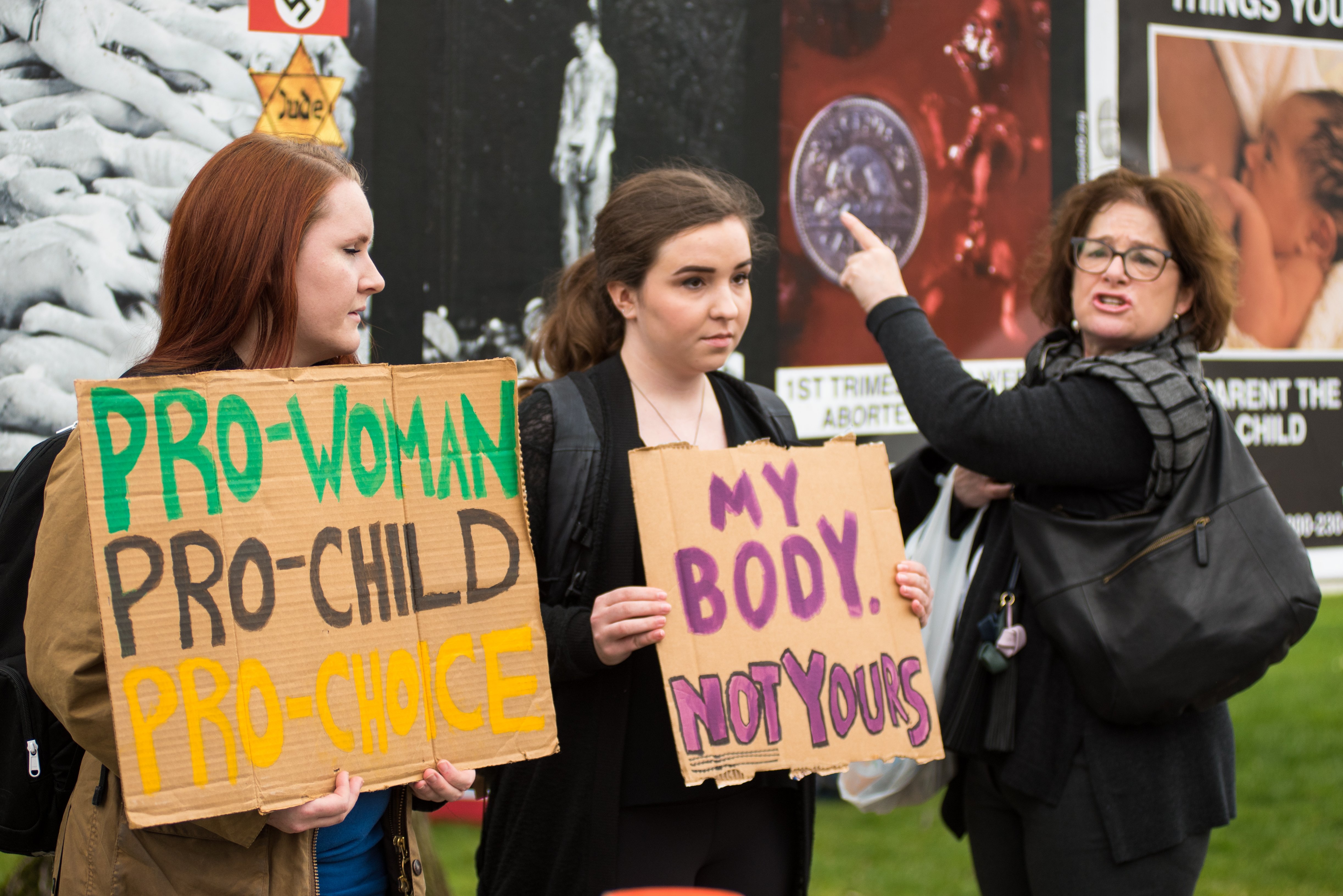 Pro-life activists protesting outside Lasserre Building