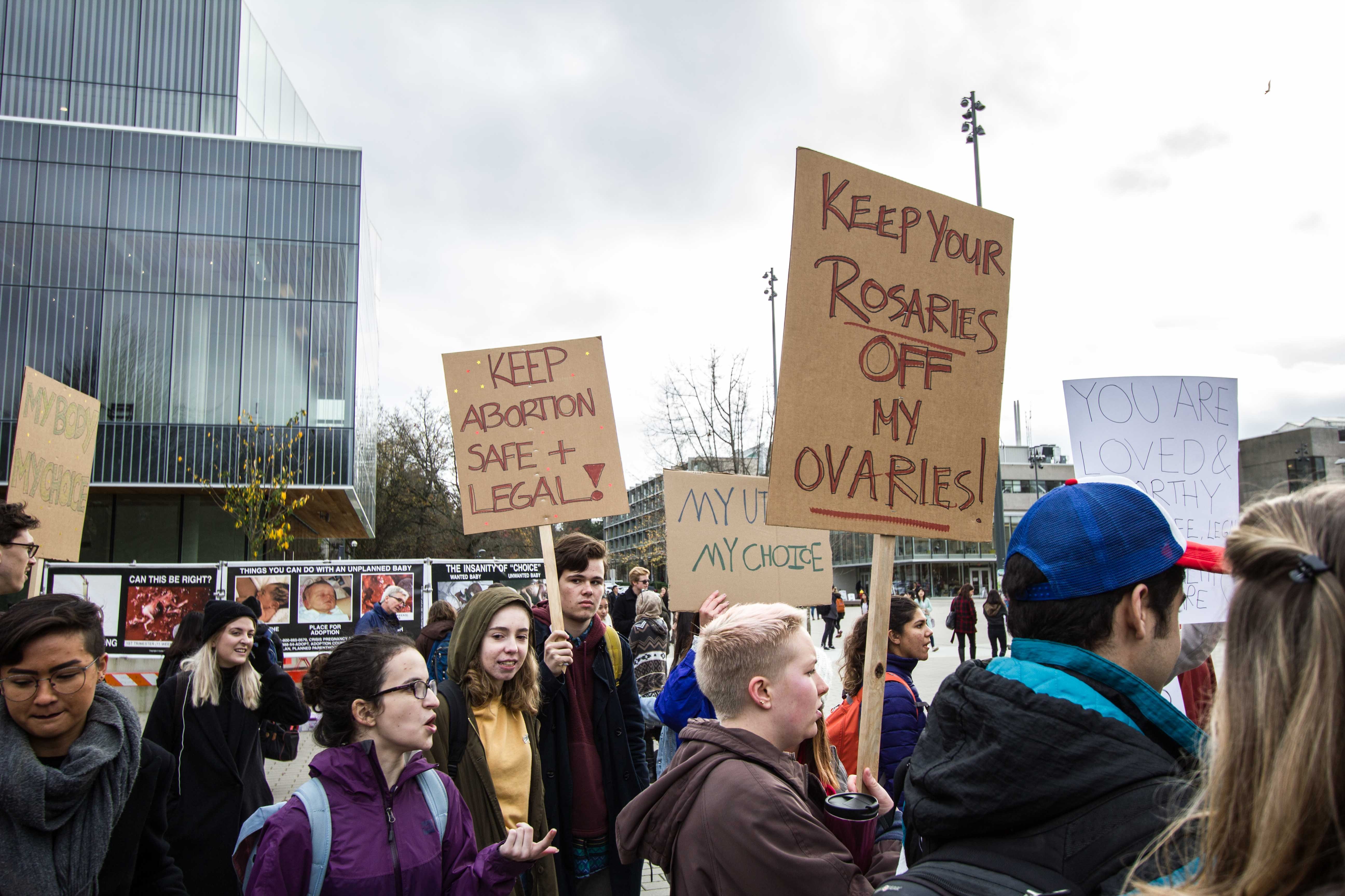 Graphic: Pro-life activists protest outside of the Nest